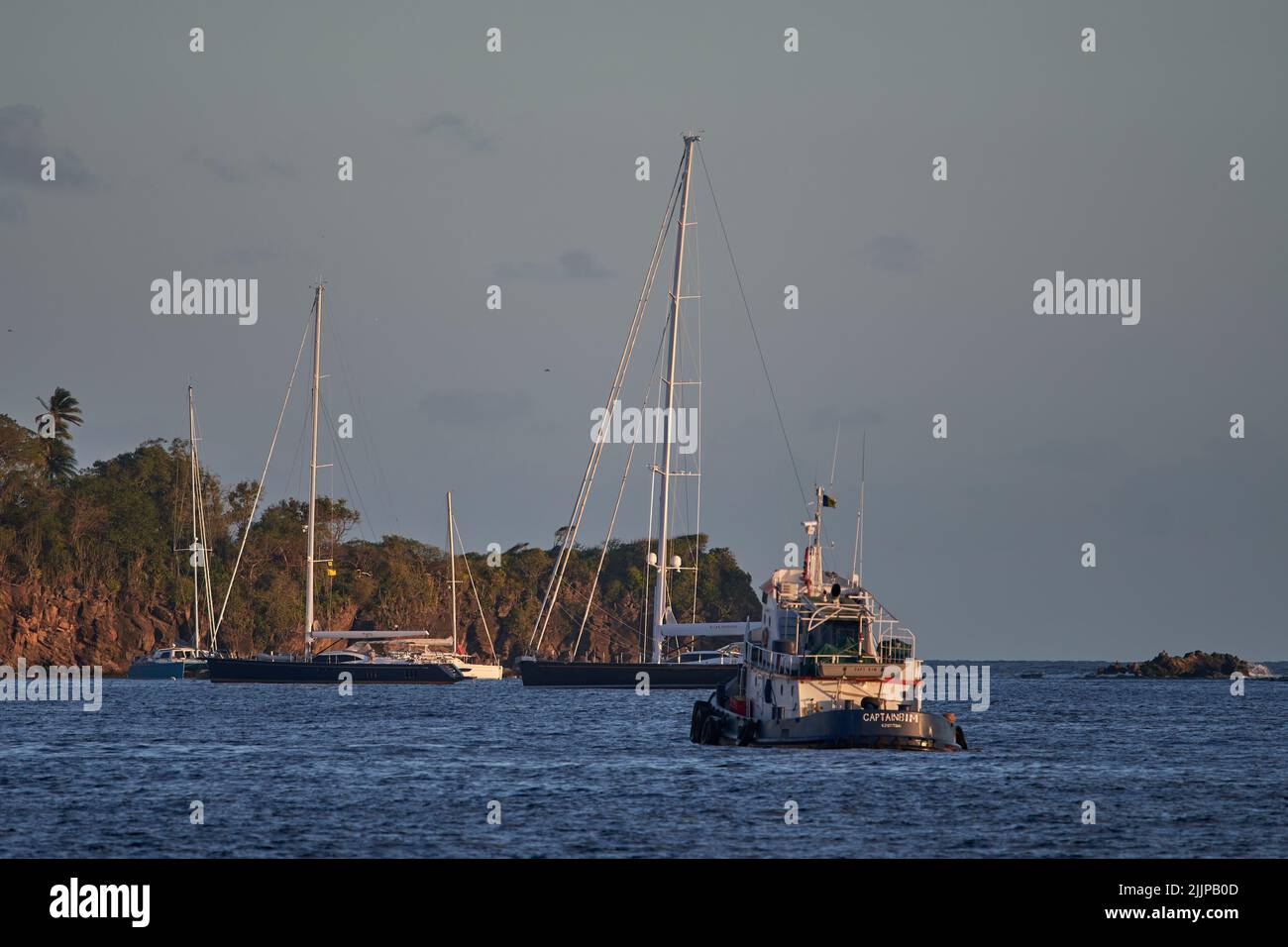 A closeup of boats sailing in the sea near Islands Stock Photo - Alamy