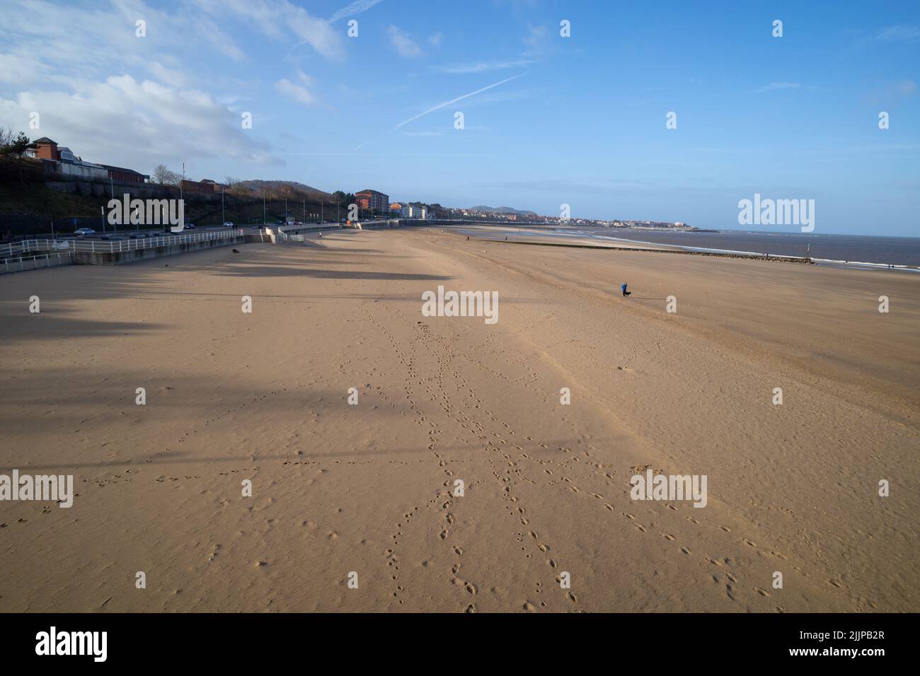An areal view of the beach on a sunny day in Colwyn bay, North Wales UK ...