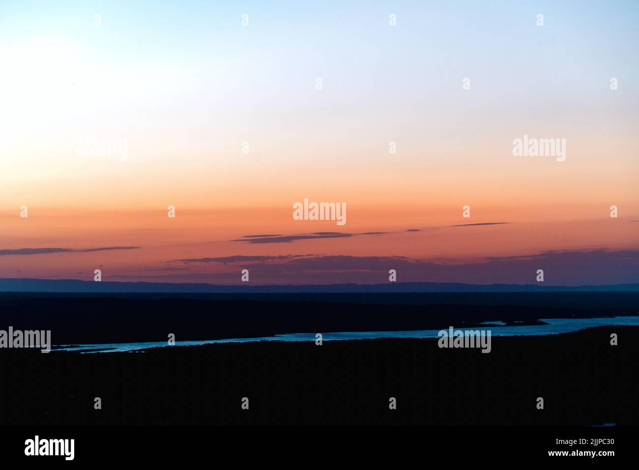A beautiful landscape of the horizon and a river on the sunset Stock ...