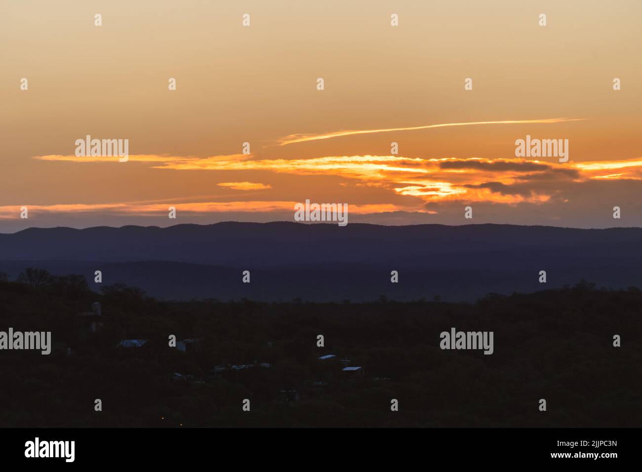 A silhouette of hills on the sunset Stock Photo - Alamy