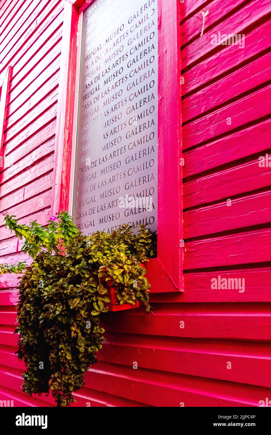 A pink wall of a wooden building in Puerto Plata, Dominican Republic ...