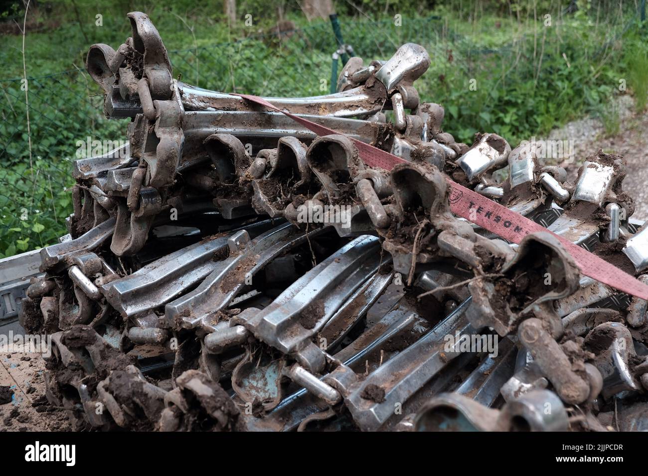 A heap of scrap metals abandoned in the middle of the forest Stock ...