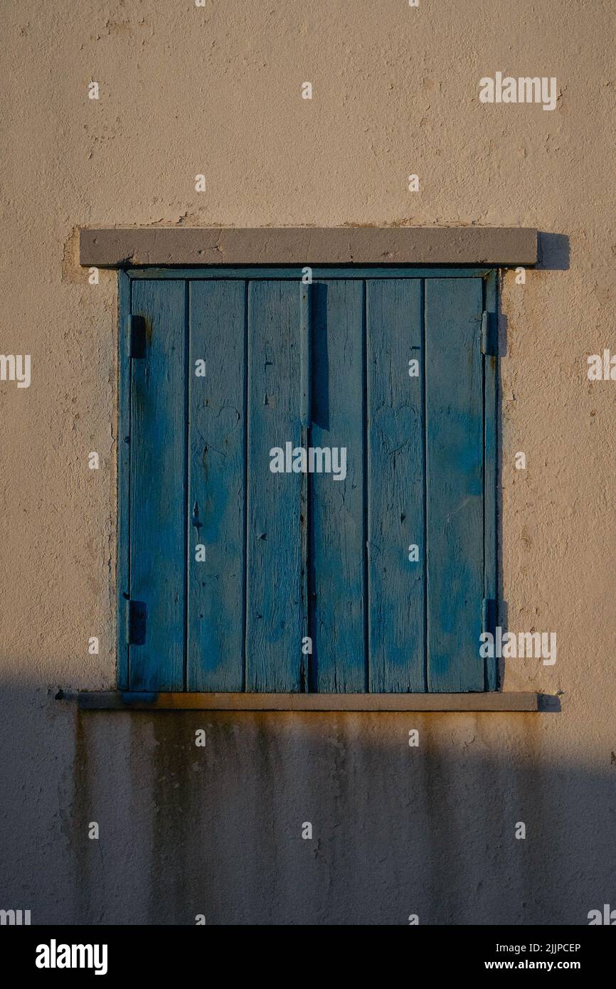 A blue minimal window from a small house in a small typical portuguese ...