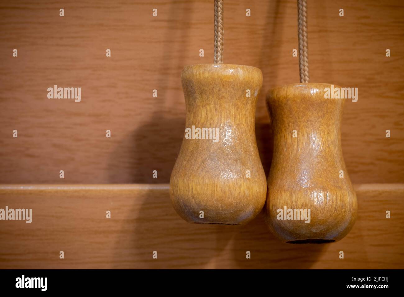 A pair of elegant knobs of the pull string for fancy wooden shutters at ...