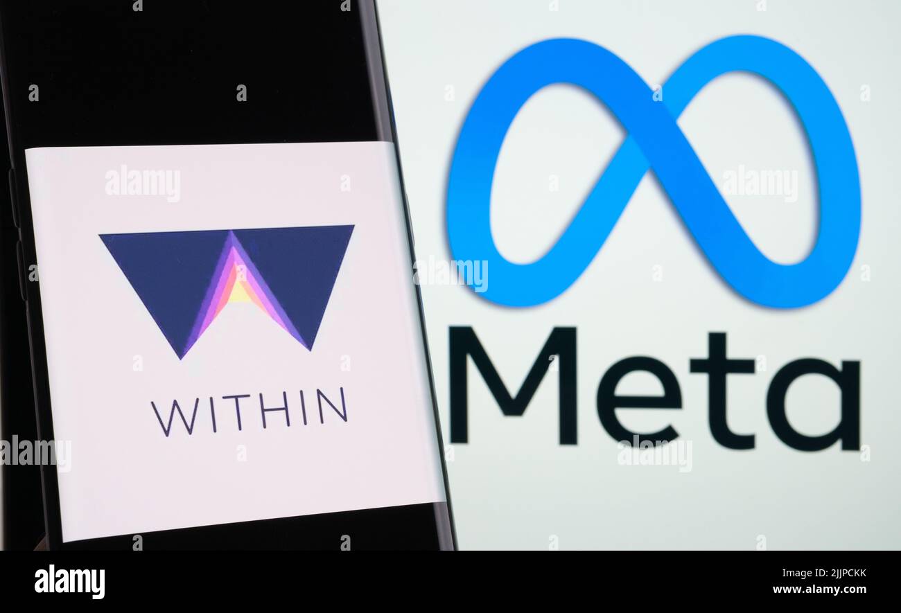 WITHIN VR app logo seen on smartphone and blurred Facebook Meta logo on ...