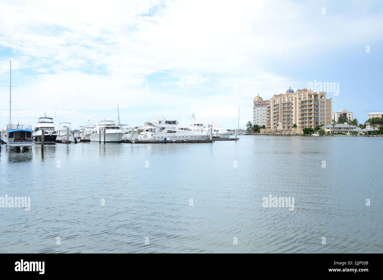 A scenic view of ships in the port on a cloudy sky background Stock ...