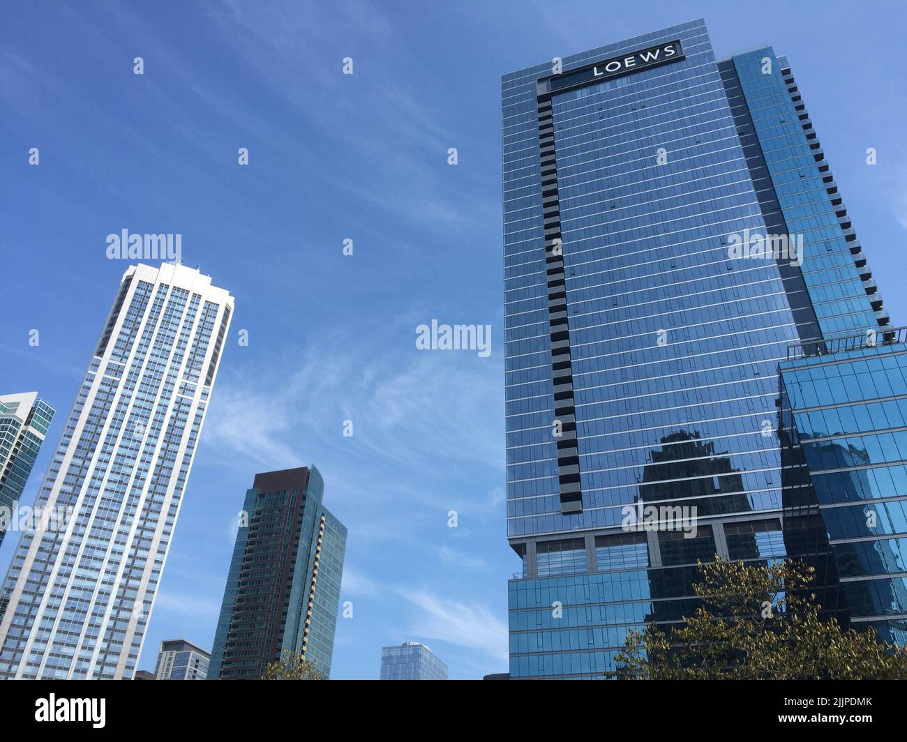 A low angle of Chicago buildings with blue sky Stock Photo - Alamy