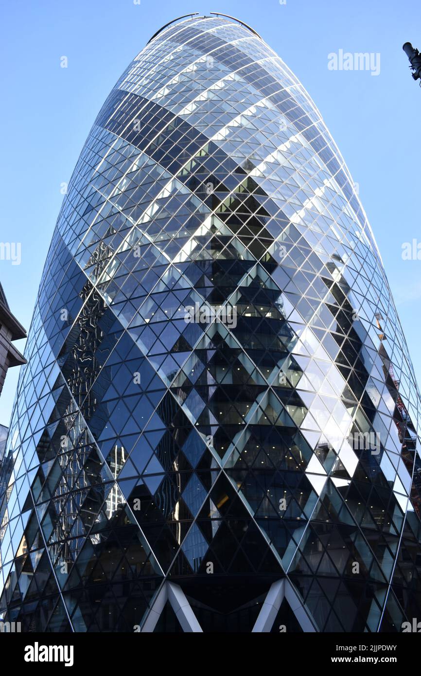 A vertical shot of the 30 St Mary Axe (The Gherkin) Skyscraper in ...