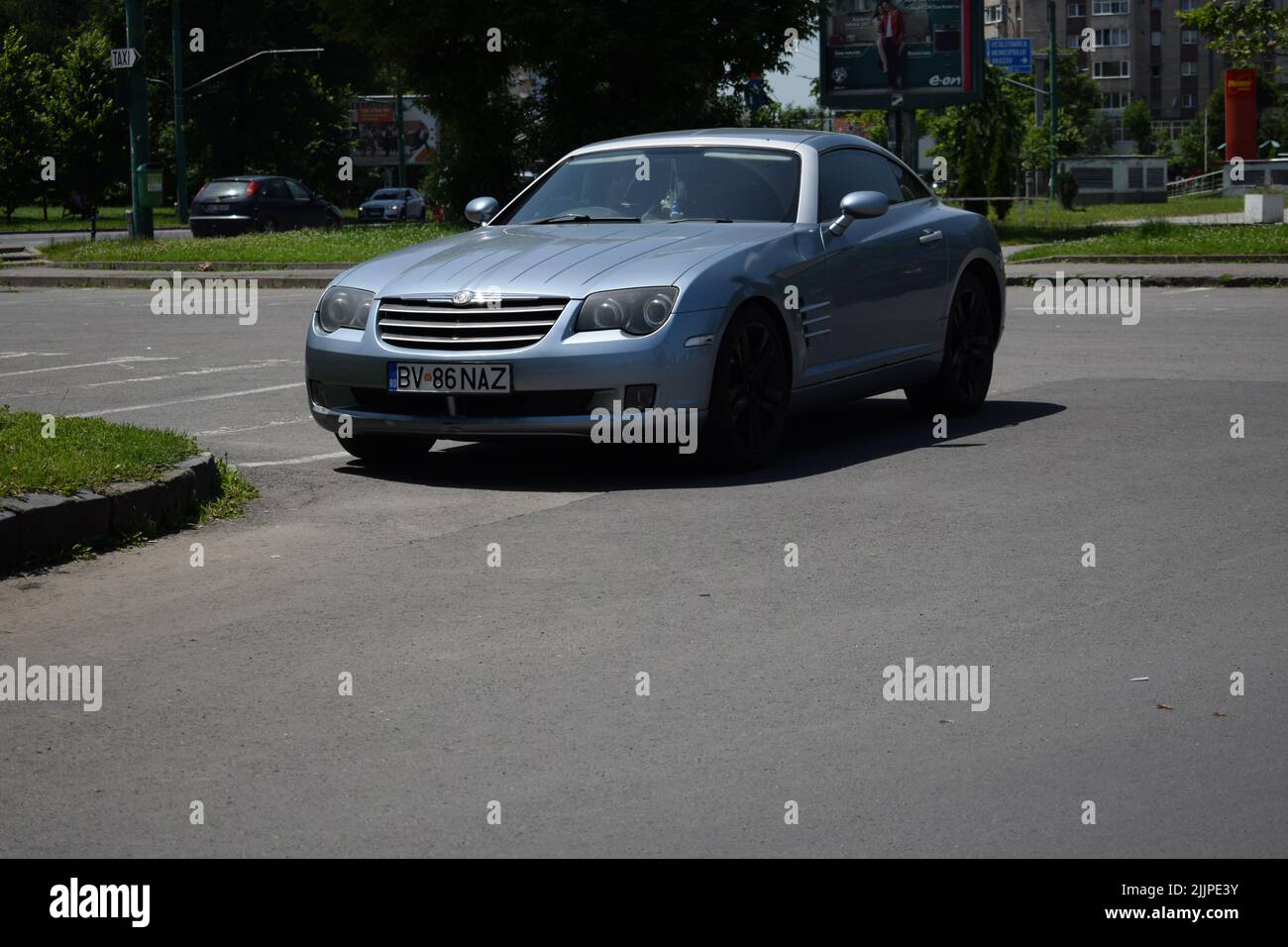 A light blue car on the street in Brasov Romania Stock Photo - Alamy