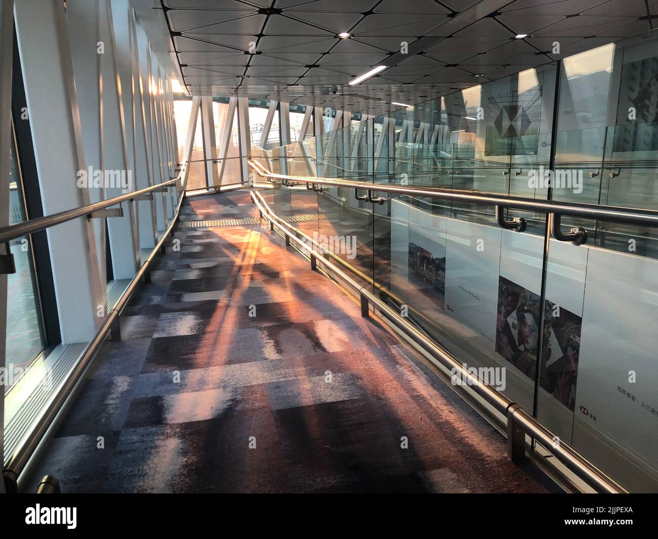 A sunshine at the boarding gate of Hong Kong International Airport ...