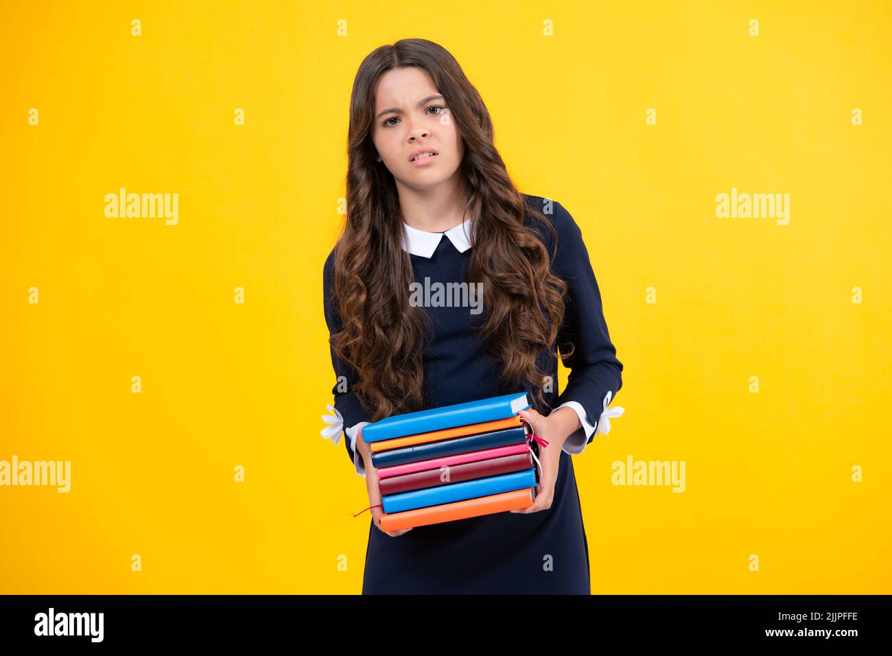 Schoolgirl with copy book posing on isolated background. Literature ...