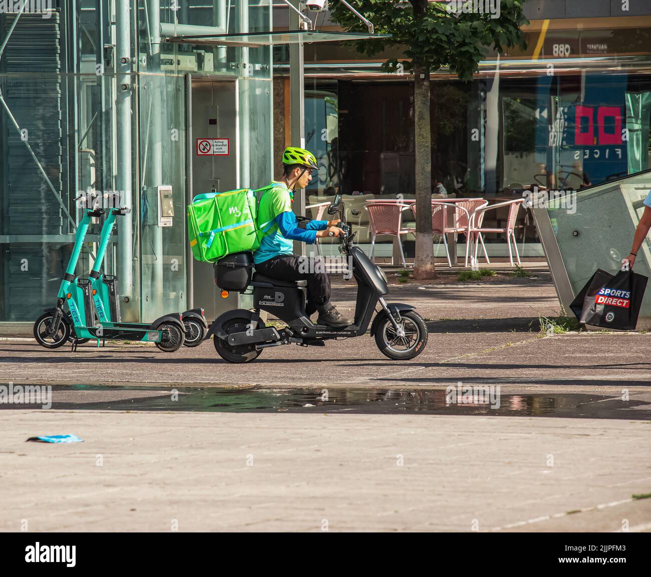 Delivering bike driver hi-res stock photography and images - Alamy