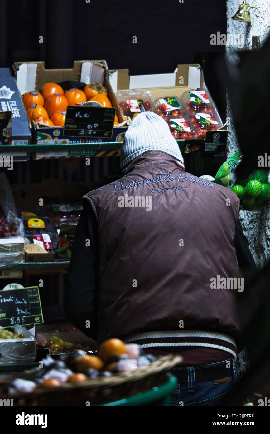Market man fruits vegetables hi-res stock photography and images - Alamy