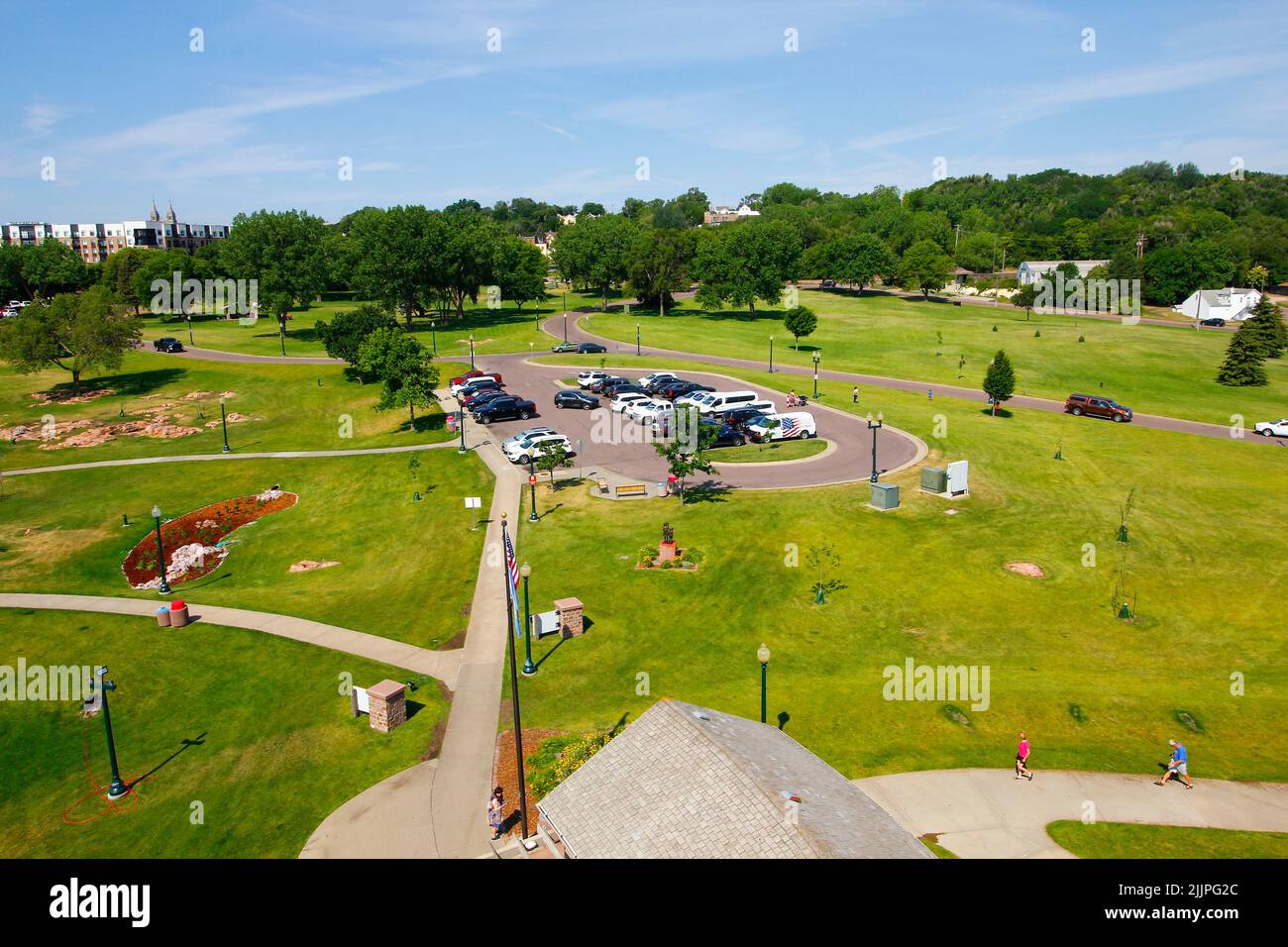 A high angle shot of the Falls park with cars and buses parked in the ...