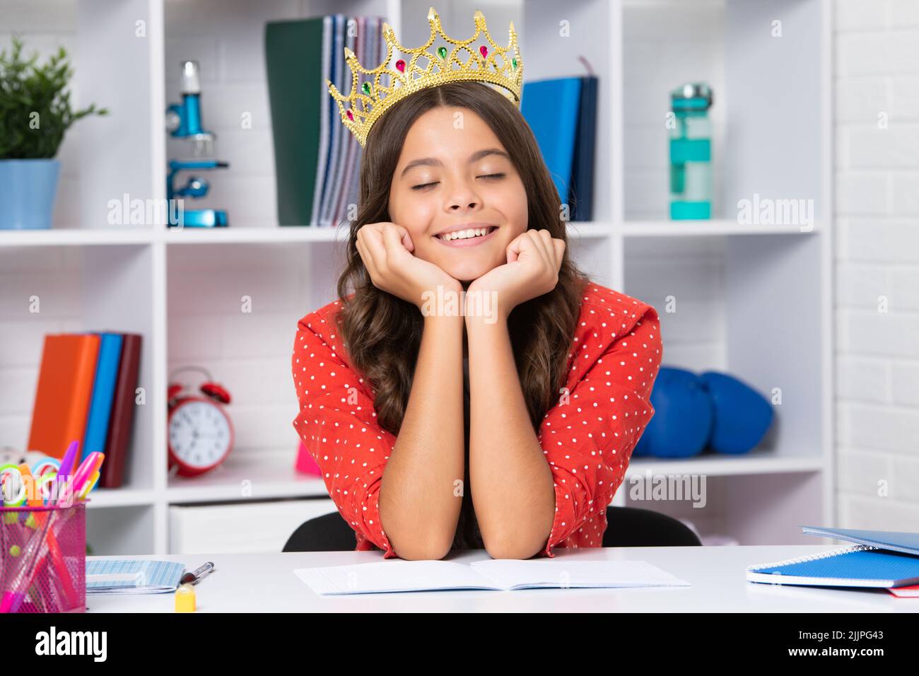Princess school girl. Portrait of dreaming teenage girl with crown ...