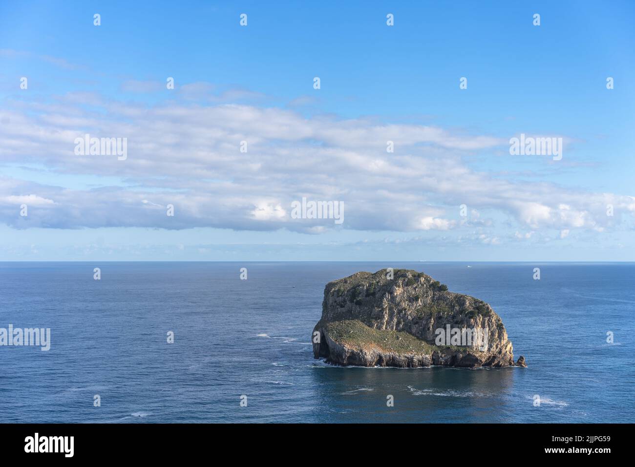 A small rocky island in sea in Basque Country Stock Photo - Alamy