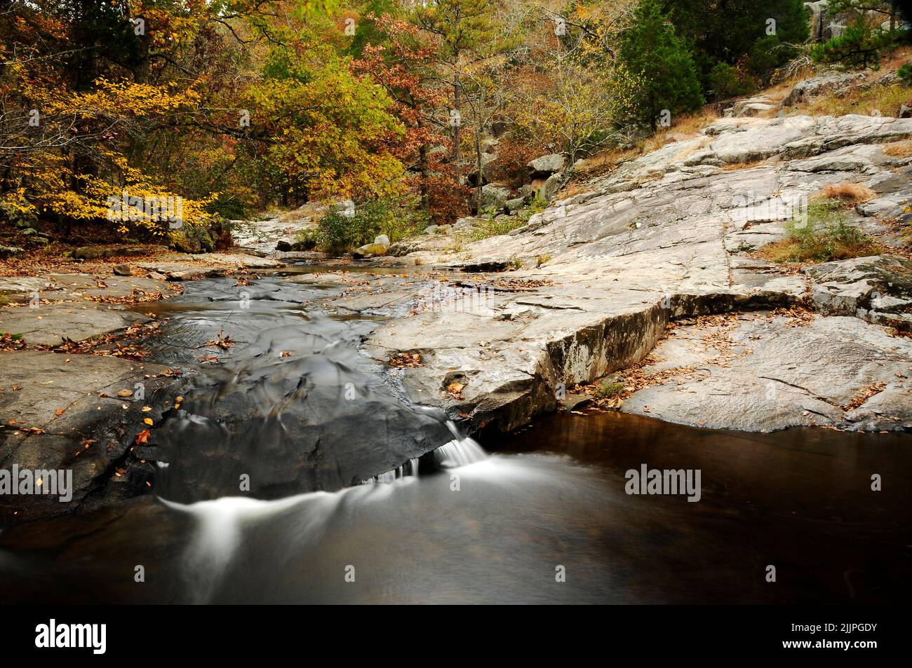 A beautiful shot of Pickle Creek with beautiful fall foliage near Ste ...