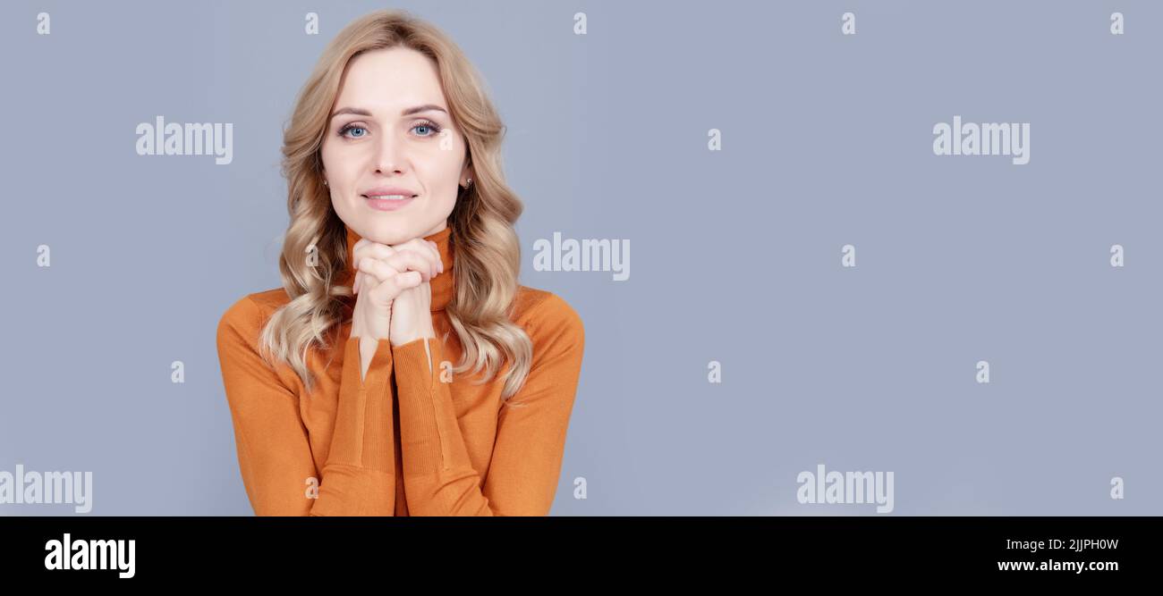 beautiful blonde woman has curly hair hold hands, fashion. Woman ...