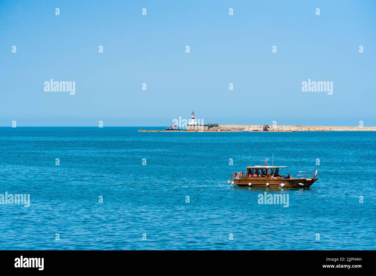 Lighthouse blue ocean sunset landscape light water nature sky scenic ...