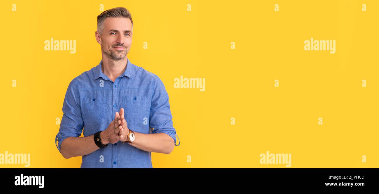 smiling man with wristwatch on yellow background, fashion accessory ...