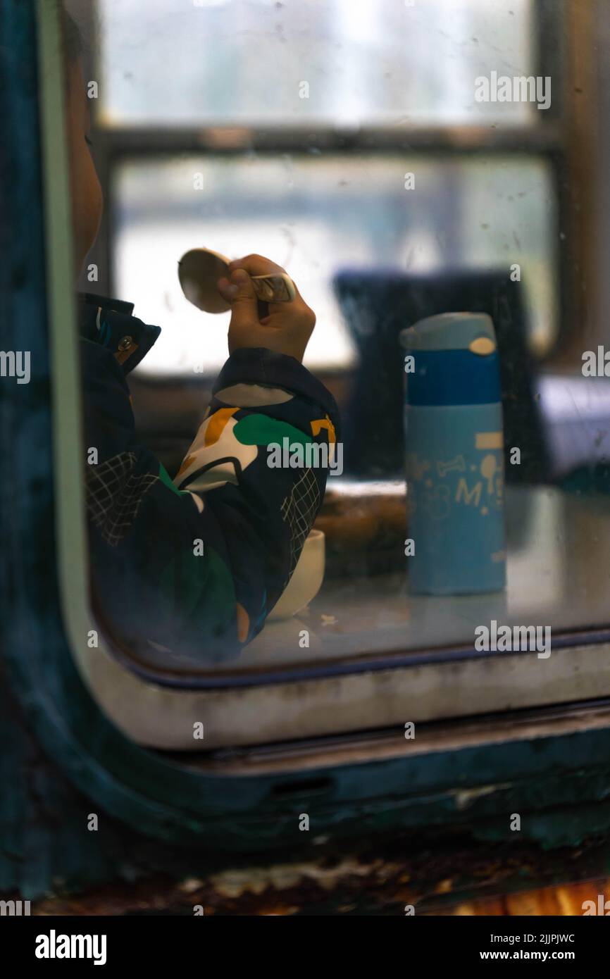 Eating vertical hi-res stock photography and images - Alamy