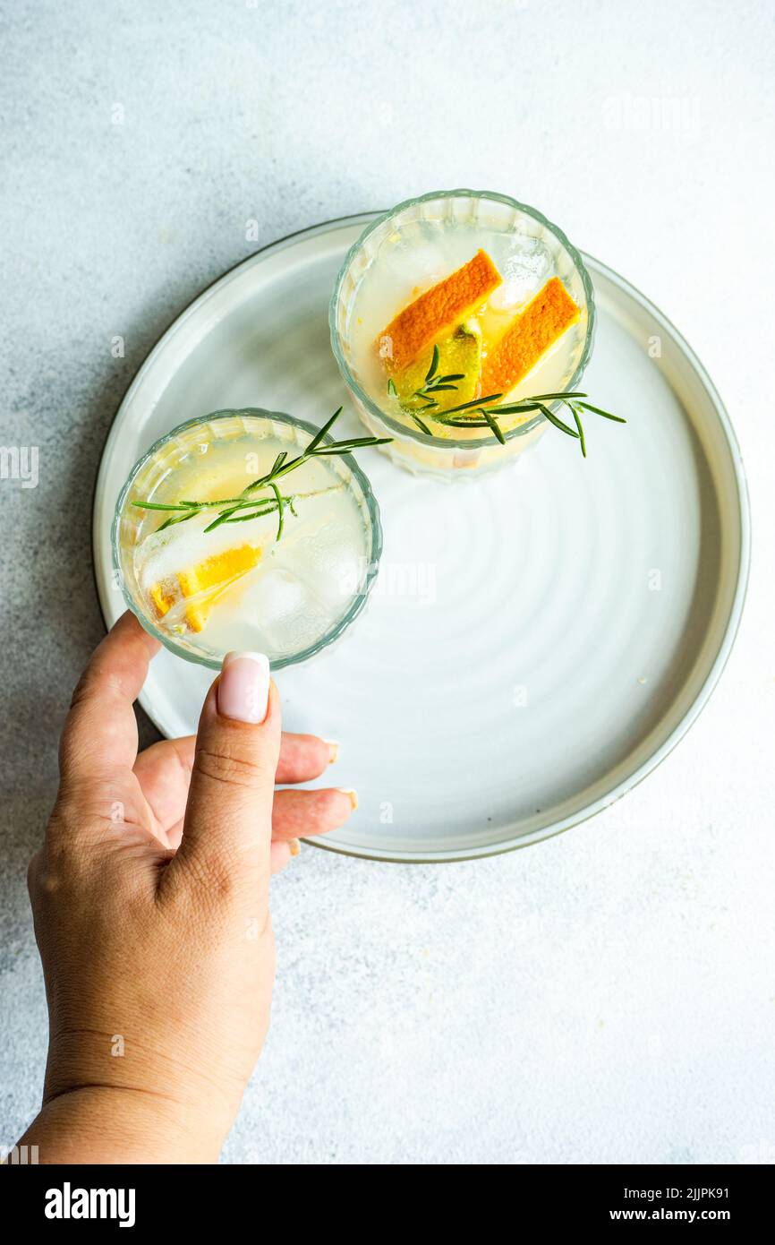 Woman holding tray cocktails hi-res stock photography and images - Alamy