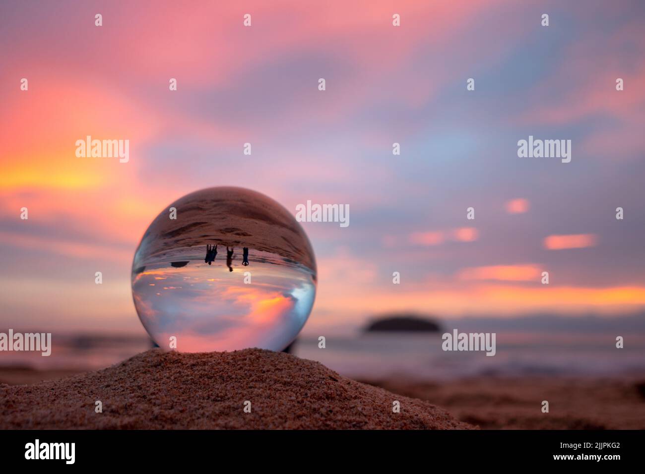 view of beautiful nature at sunset inside crystal ball. stunning sunset ...