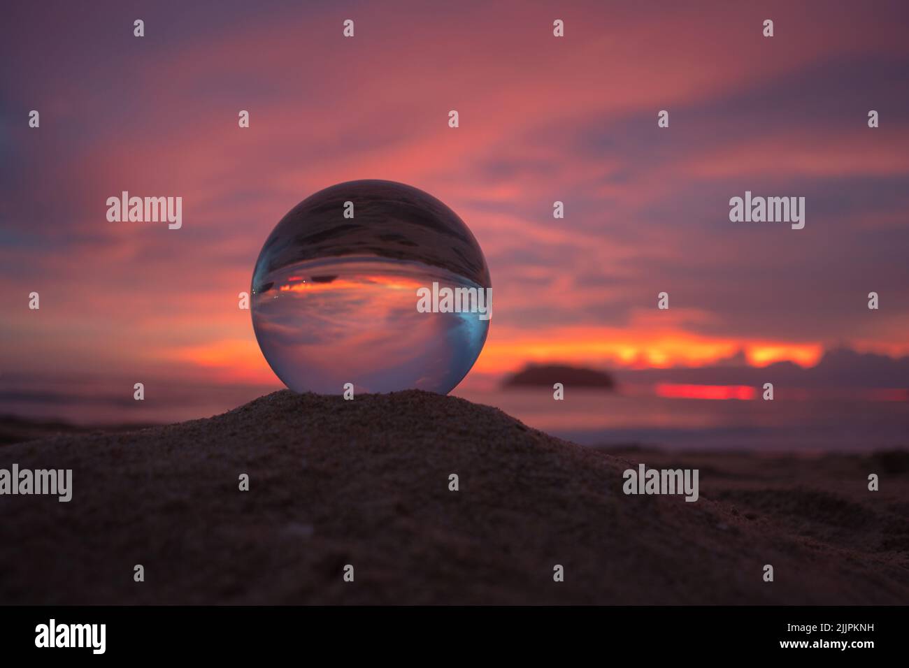 view of beautiful nature at sunset inside crystal ball. stunning sunset ...