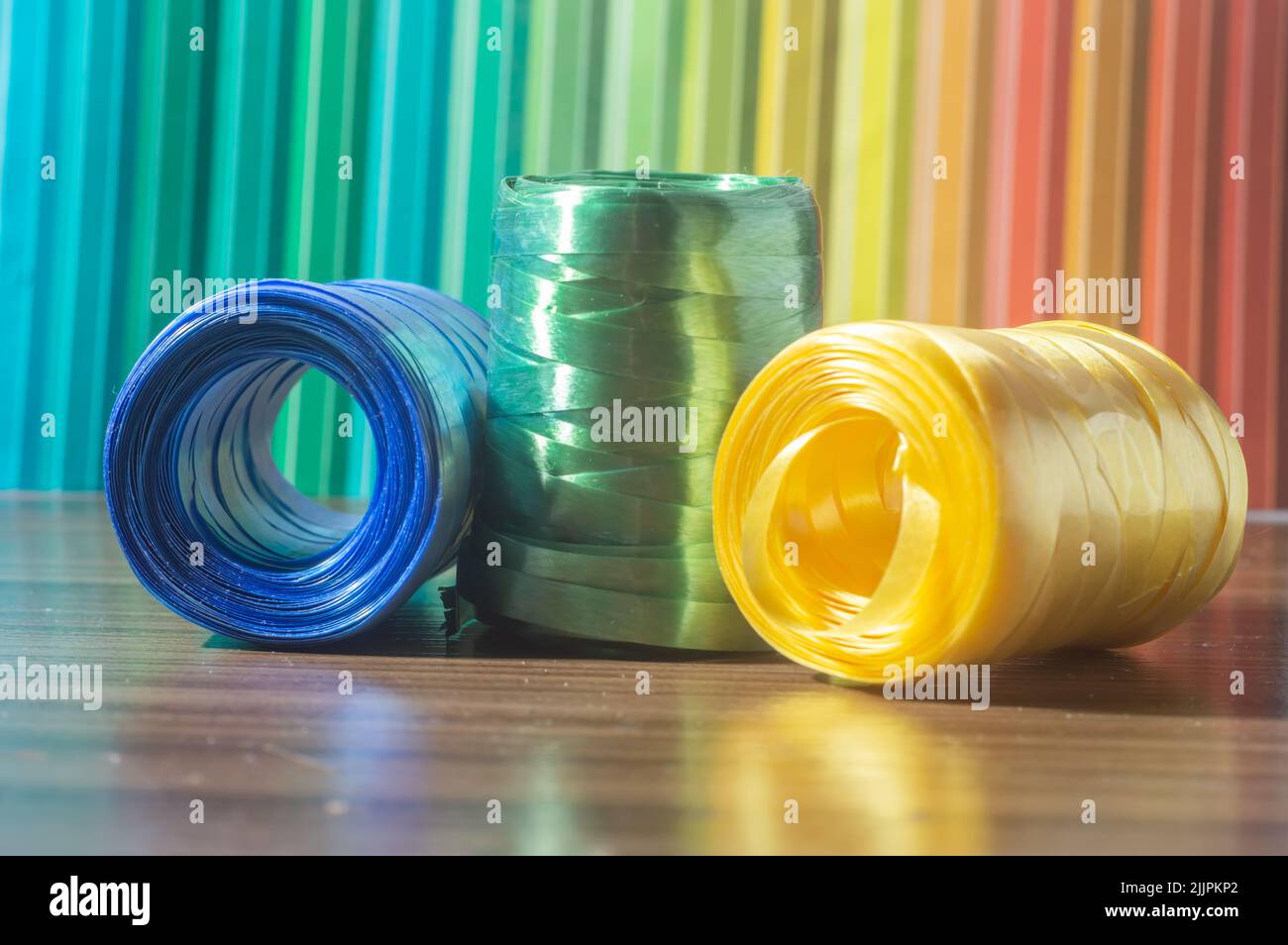 Colorful ribbons with colors yellow and blue green with colorful ...