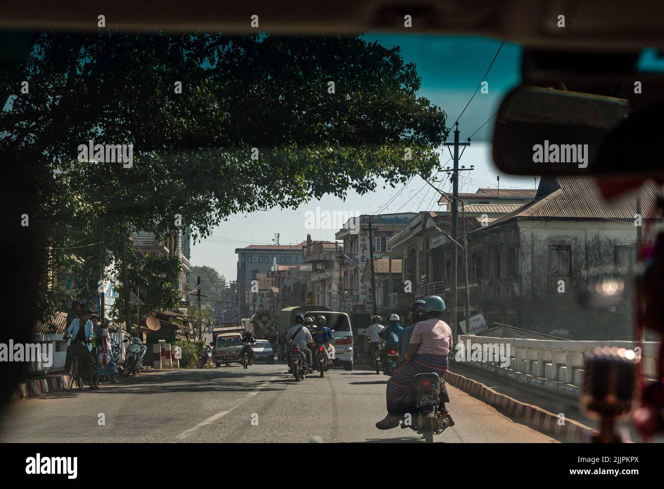 A view of a Village street scene in Hpa An, Myanmar at dusk Stock Photo ...
