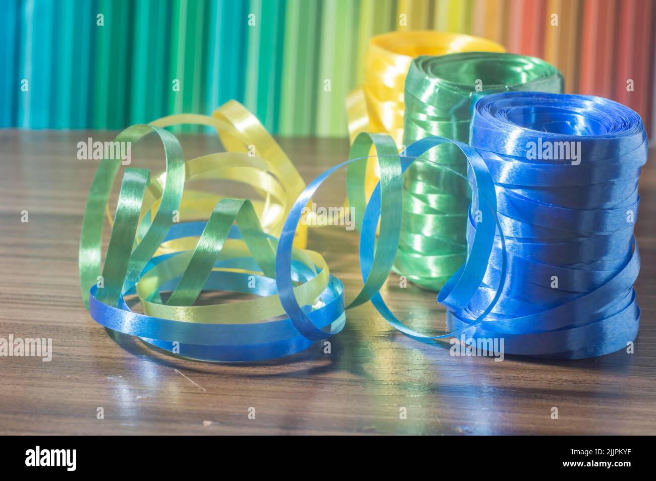 Colorful ribbons with colors yellow and blue green with colorful ...