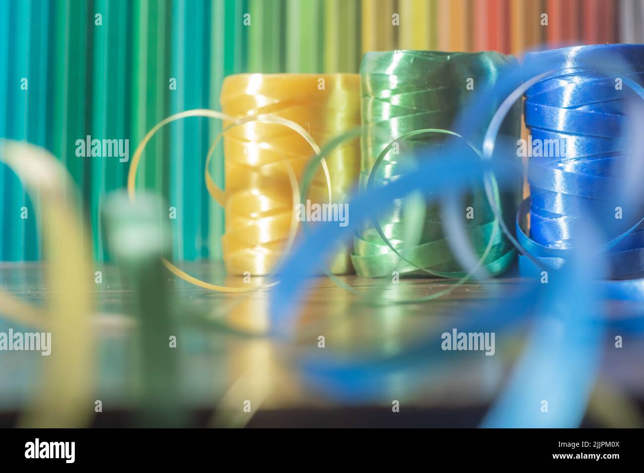 Colorful ribbons with colors yellow and blue green with colorful ...