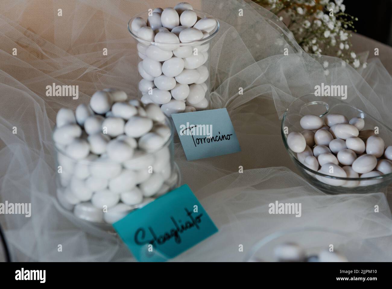 A beautifully decorated wedding reception in white and turquoise colors ...