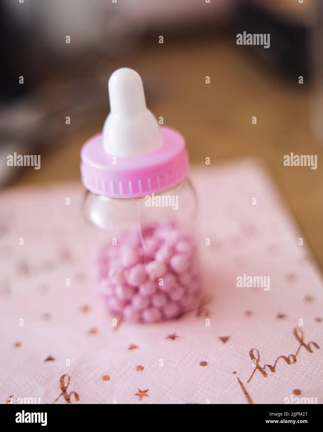 Girl pink baby bottle with food inside, baby shower decorations Stock ...