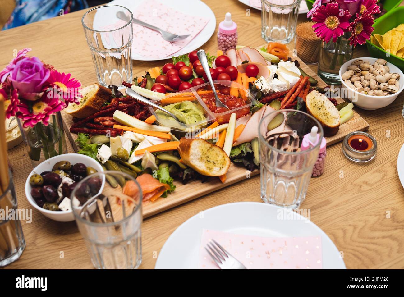 Pink table set, baby shower table look ideas Stock Photo - Alamy