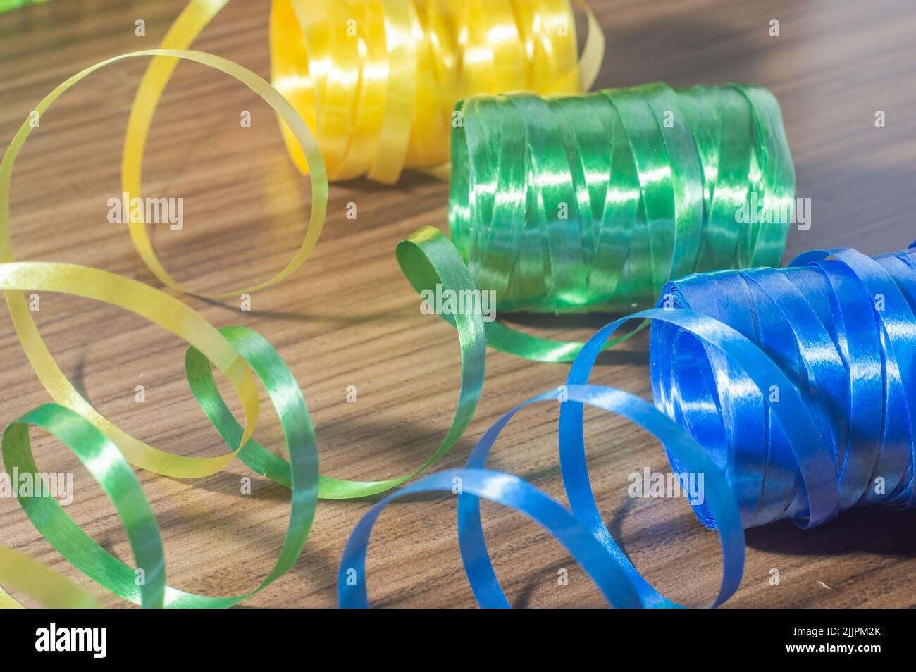 Colorful ribbons with colors yellow and blue green with colorful ...