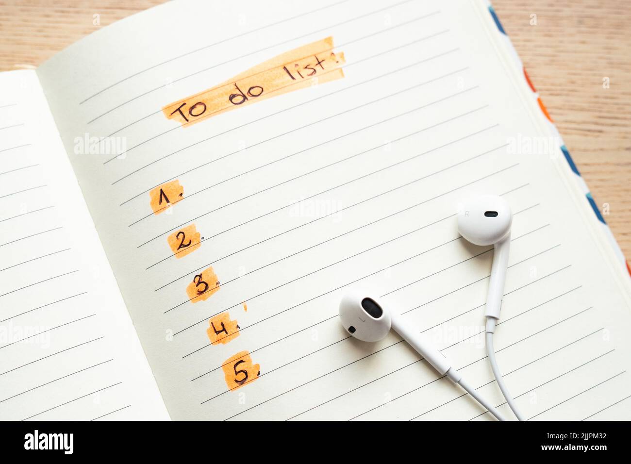 Open notebook To do list, paper, pen, headphones Stock Photo - Alamy