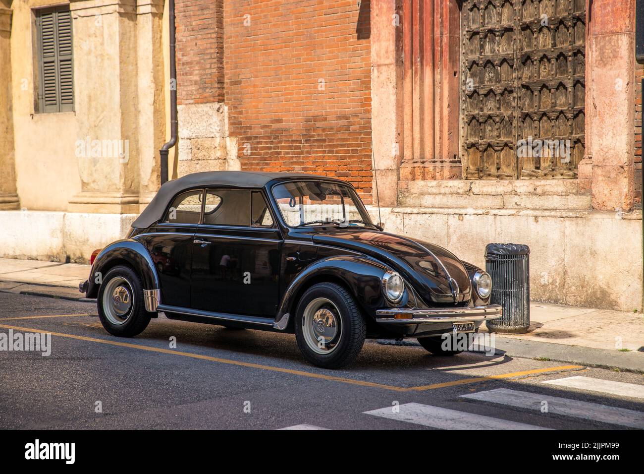 A black vintage car, VW Beetle in downtown Verona Stock Photo - Alamy