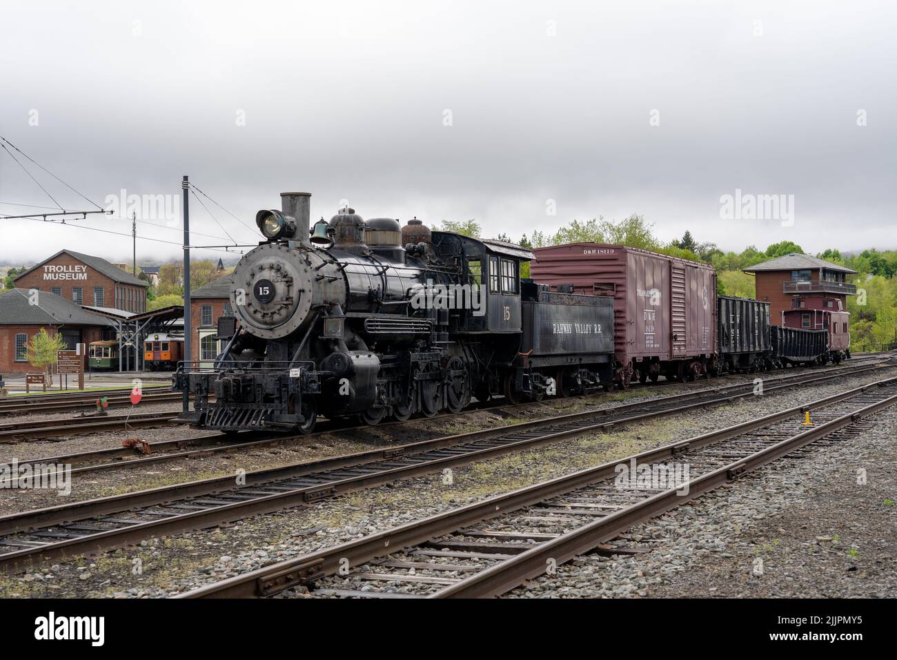 An old and historic steam train on track in a museum Stock Photo - Alamy