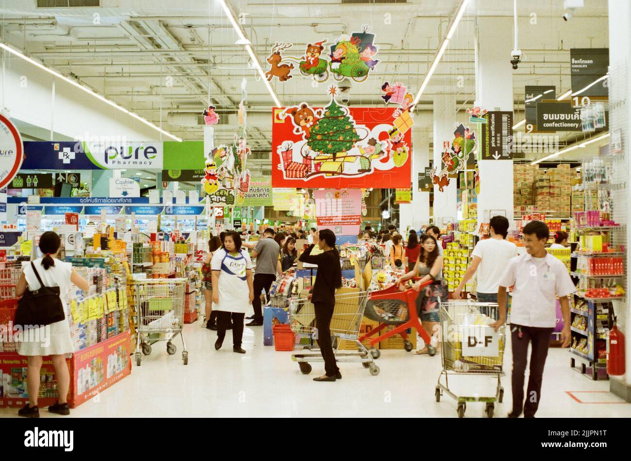 A crowded supermarket in Bangkok, Thailand during Christmas time Stock ...