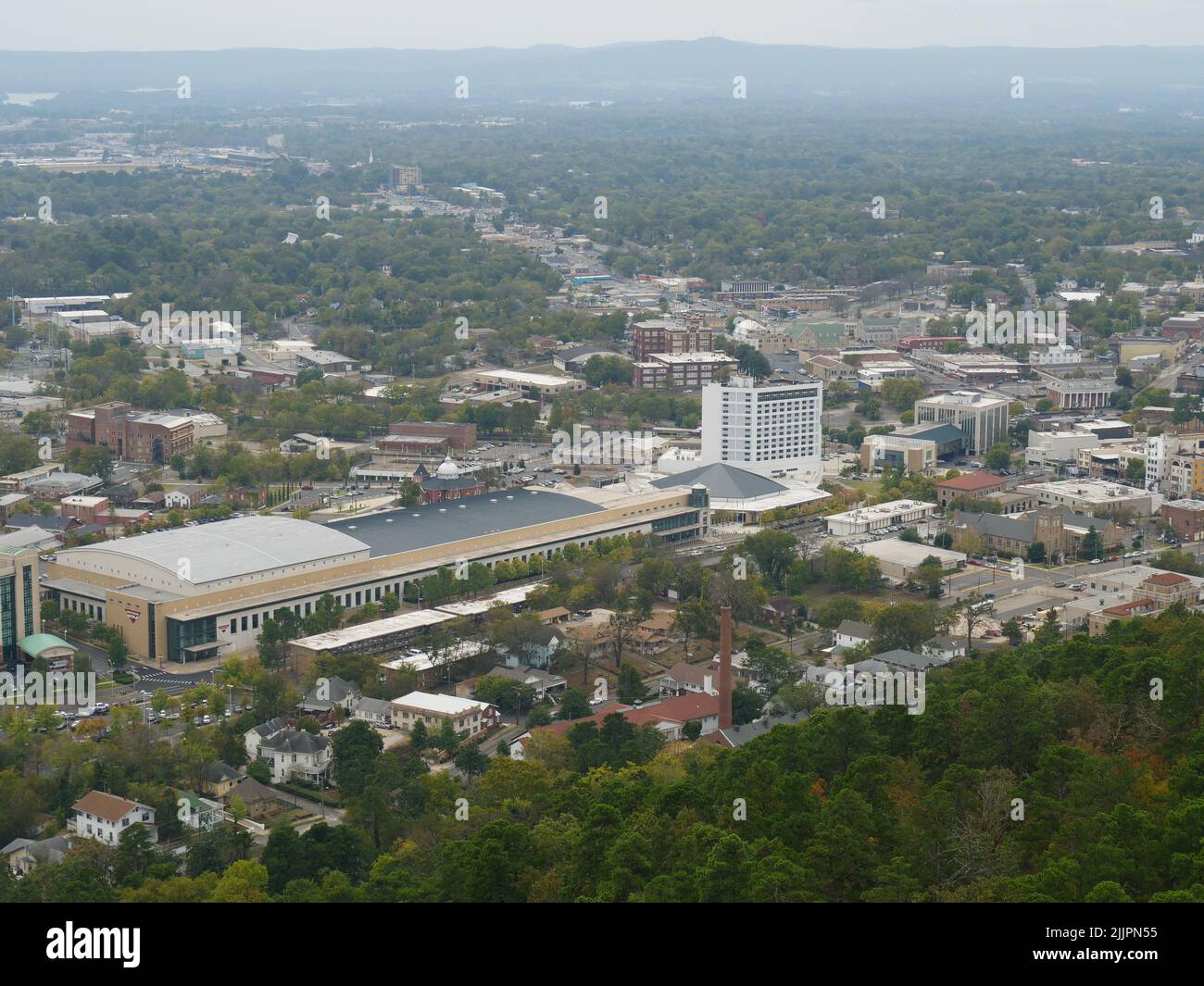 An aerial cityscape of Arkansas surrounded by buildings and trees Stock ...