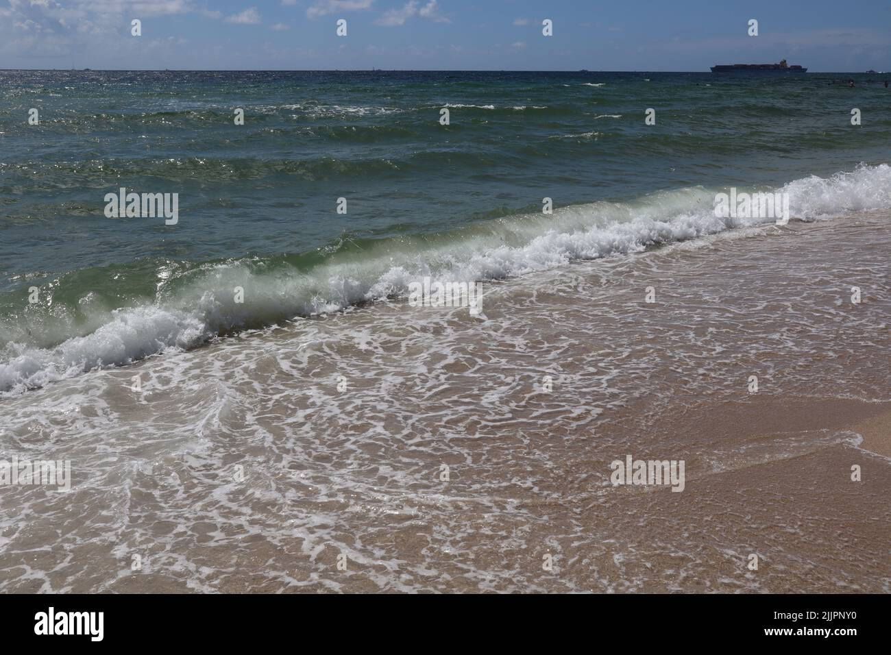 A beautiful landscape view of an Atlantic Ocean wave crashing ion the ...