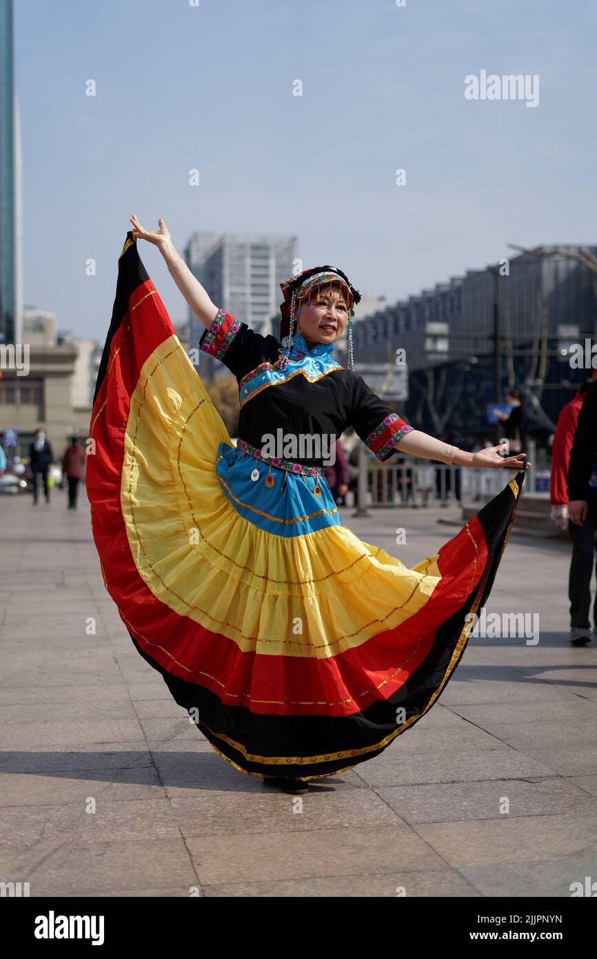 A portrait of female wearing cultural clothes of Xinjiang during the ...