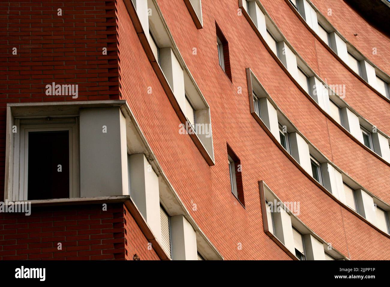 A red-tiled brick apartment building in Bilbao Stock Photo - Alamy