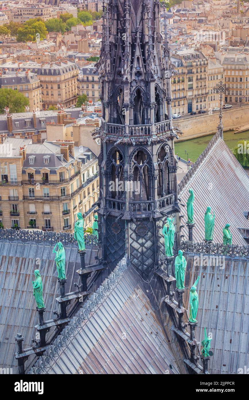 Notre Dame Cathedral of Paris spire from above with statues, France ...