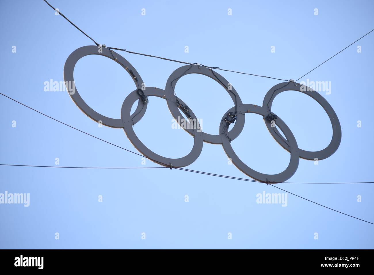 The circular led lights supported by wires forming the Olympic Games ...