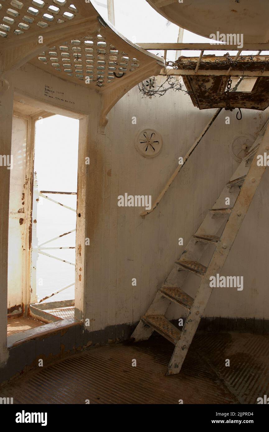 A vertical shot of doors and stairs in an ancient lighthouse Stock ...