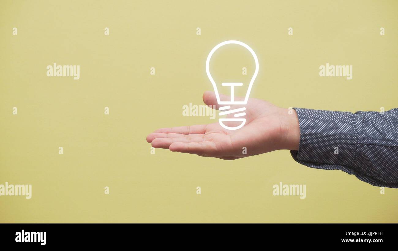 A closeup shot of a hand with the logo of lump bulb definition of an ...