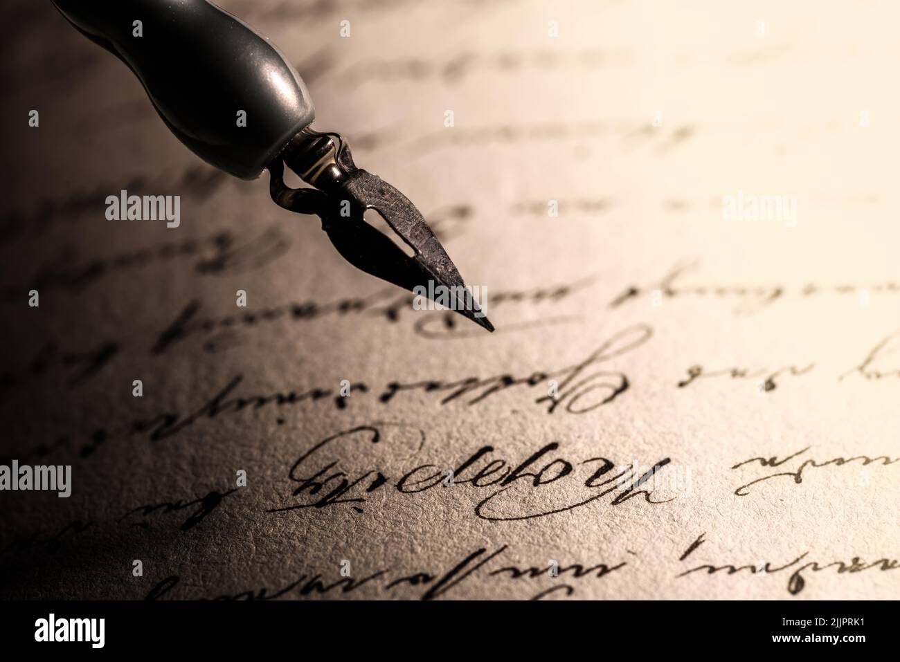 An old pen over the old manuscript, old writing, archival materials ...