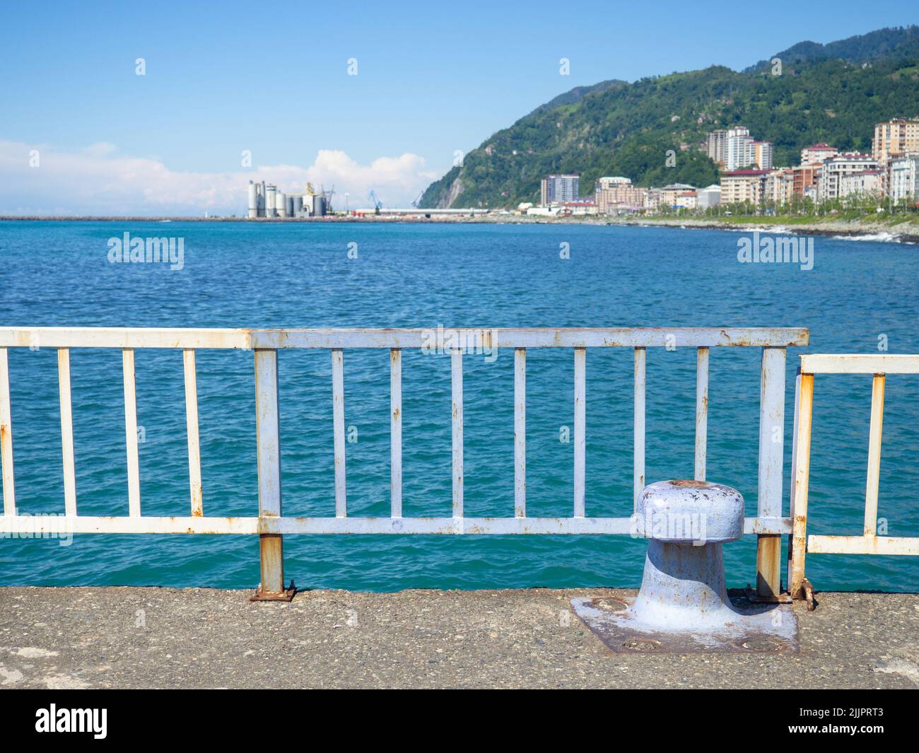 Bollards on the seashore. A place to stop ships. Give mooring line. The ...